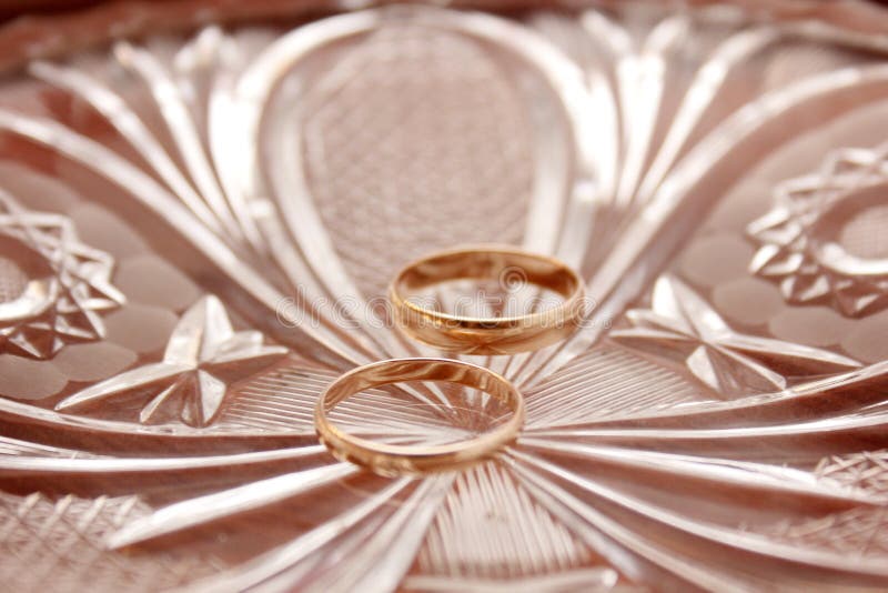 Gold Wedding Rings on a Plate Stock Photo - Image of marriage, marry ...