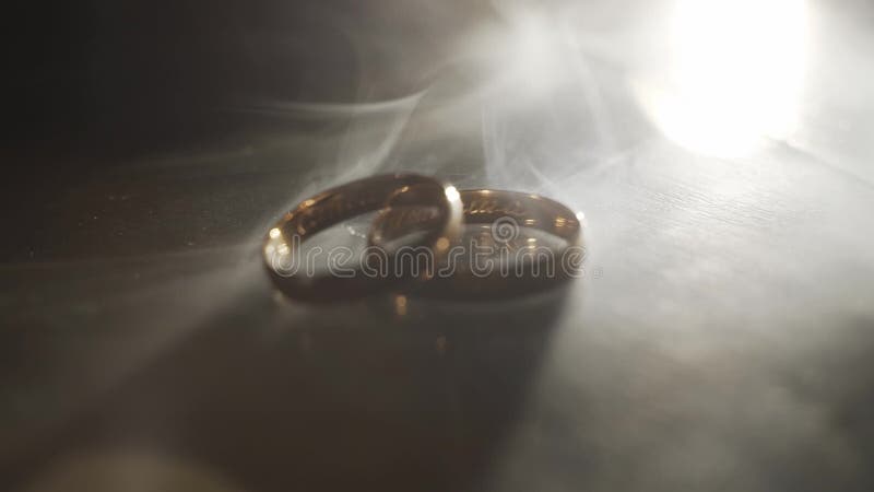 Gold Wedding Rings in the Smoke. Stock Video - Video of macro, party ...