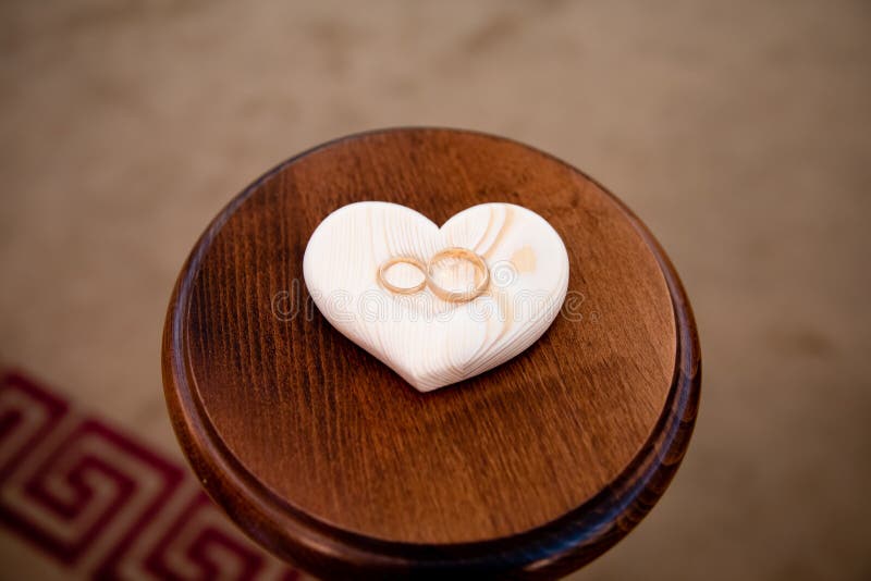 Gold Wedding Rings on Stand for Rings Stock Image - Image of gemstone ...