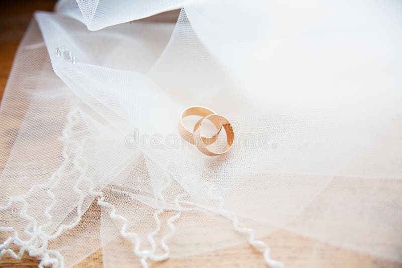 Gold Wedding Rings on a White Veil Stock Image - Image of jewelry ...