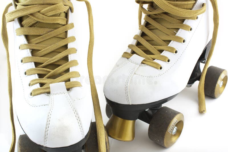 Gold and White Rollerskates Stock Photo - Image of wheel, rollerskating ...