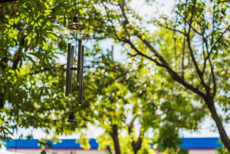 Gold Wind Bell Under the Tree Stock Photo - Image of traditional, bells ...