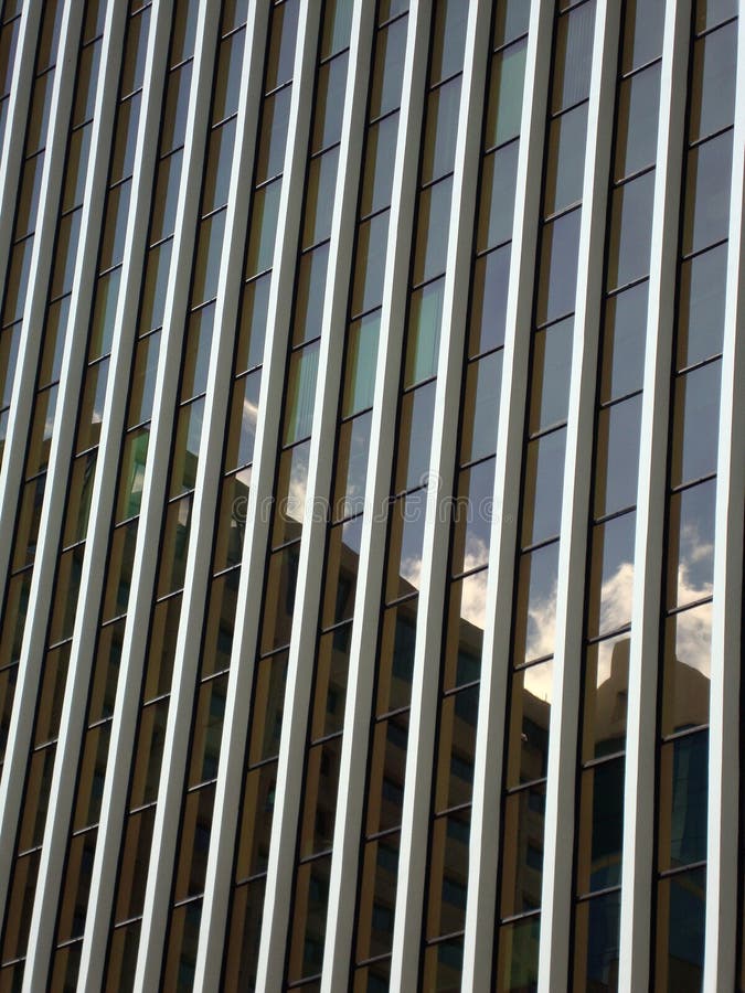 Gold Windows on Side of Office Building Editorial Photography - Image ...