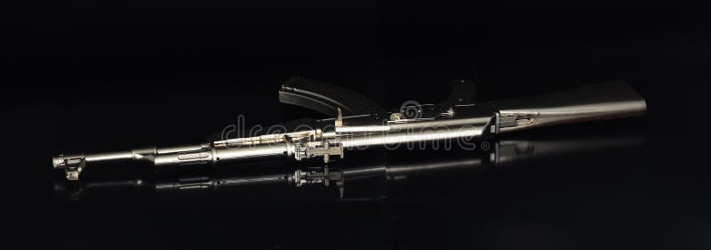 Golden AK-47 assault rifle stock photo. Image of fire - 296282024