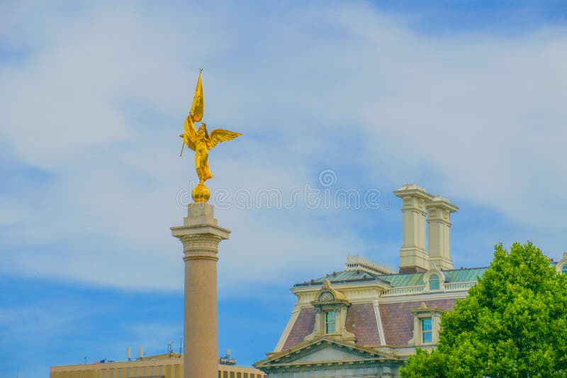 Golden angel statue stock photo. Image of cities, pillars - 311267326