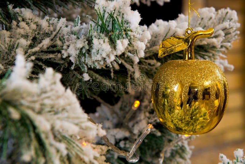 Golden Apple on Christmas Tree Stock Image - Image of christmas ...