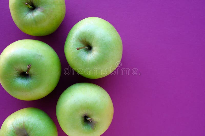 Golden Apples with Purple Background Stock Image - Image of purple ...