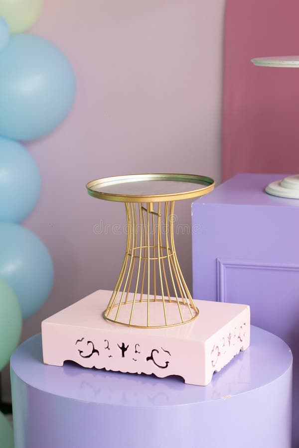 Golden Base of a Cake on a Colored Table Stock Photo - Image of ...