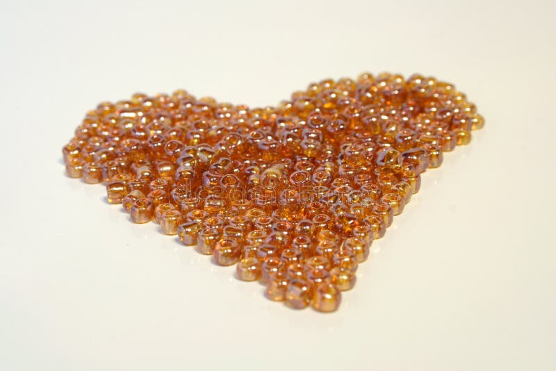 Golden Beads Laying Together Stock Image - Image of abstract, color ...