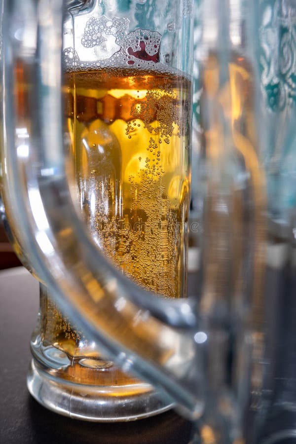 Golden Beer with Bubbles on the Sides of the Glass. Stock Photo - Image ...