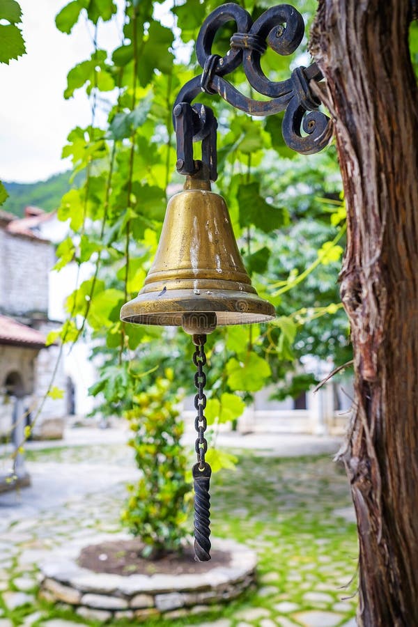 Golden bell on a tree 2 stock photo. Image of religion - 155955818