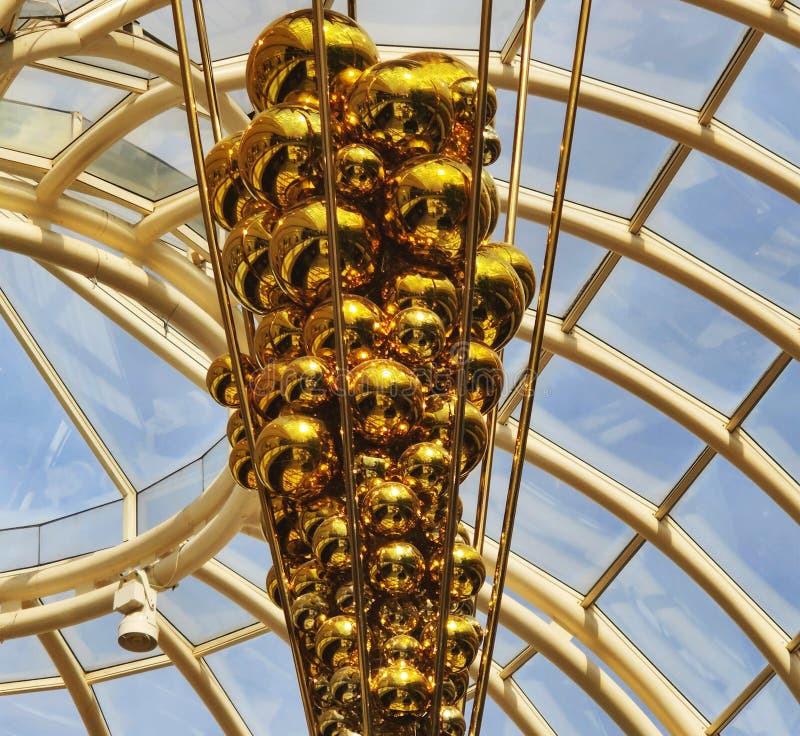 Golden Bells with Colour Light Reflections and Window Architecture ...