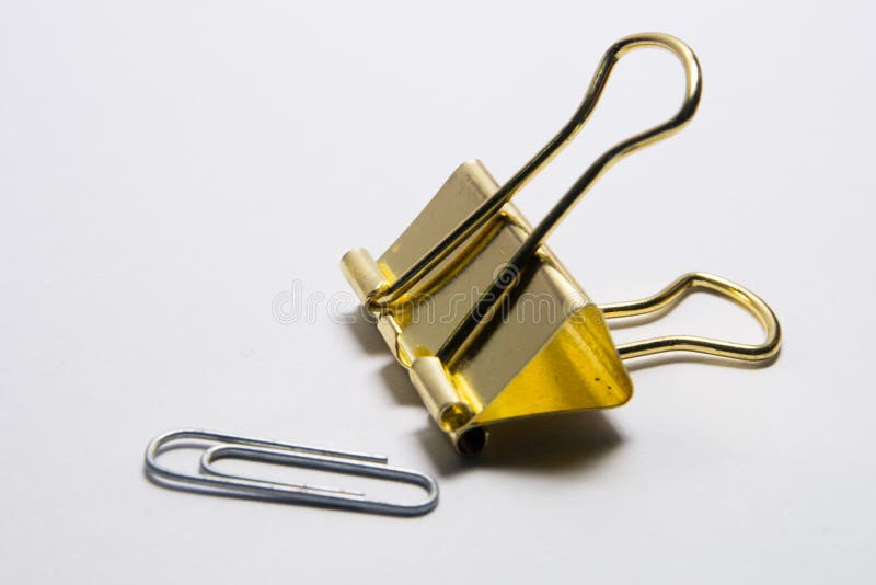 Golden Binder Clip stock photo. Image of stack, bonding - 41545870
