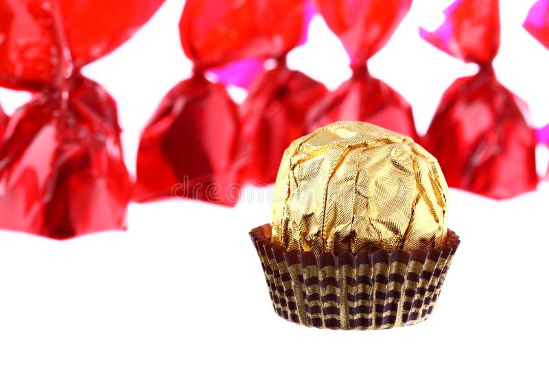 Red Luxury Sweets in Zig-zag Row Isolated on White Stock Image - Image ...