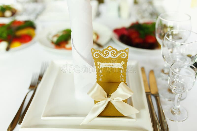 Golden Box with Guest`s Name Stand on the Square Plate Stock Image ...