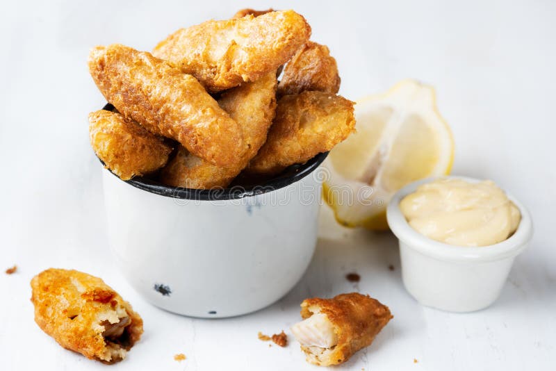 Golden Breaded Fish Fingers Stock Photo - Image of deep, lemon: 145454354