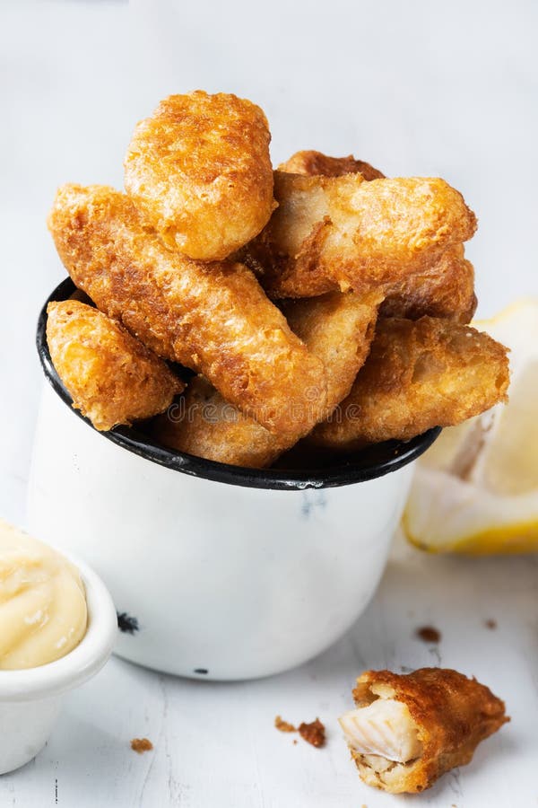 Golden Breaded Fish Fingers Stock Photo - Image of sauce, protein ...