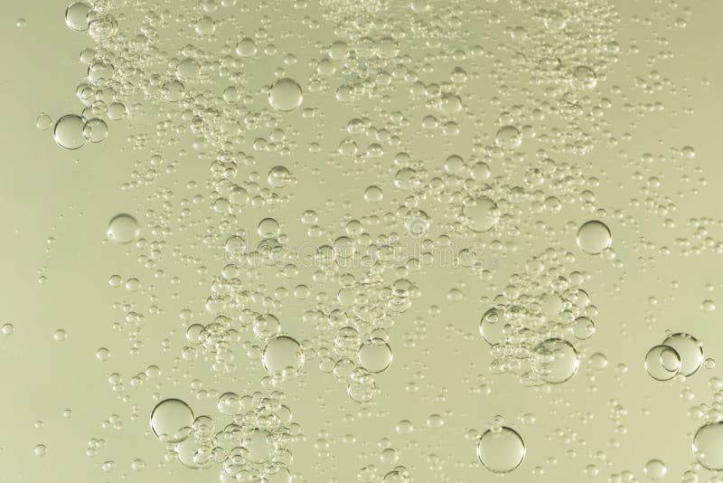 Golden Bubbles Flowing in a Glass Stock Image - Image of gold, falling ...