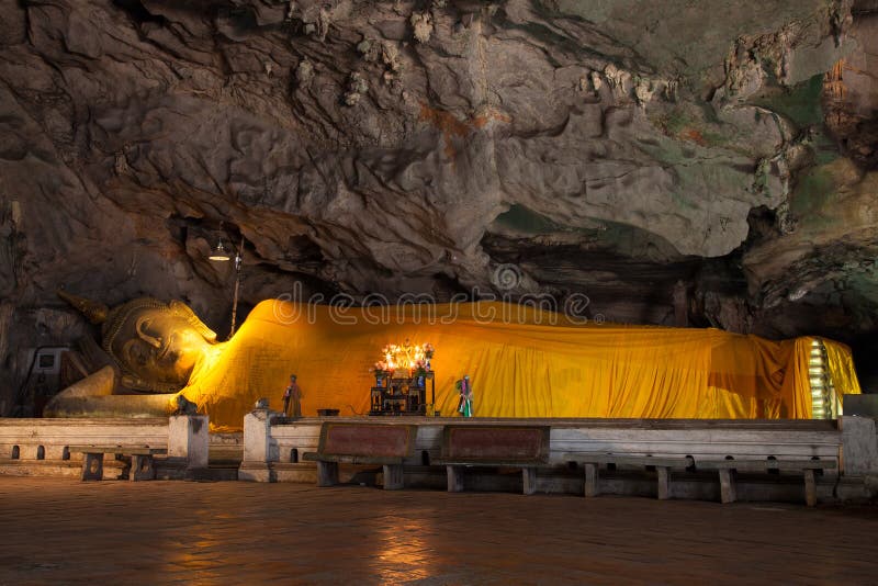 A Golden Buddha Statue in the Cave Stock Photo - Image of monastery ...