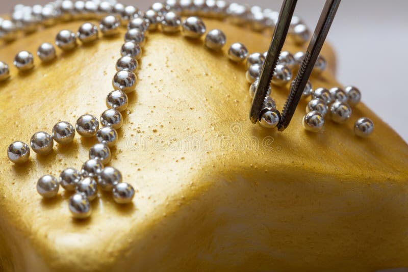 Golden cake stock image. Image of creating, precision - 64170427