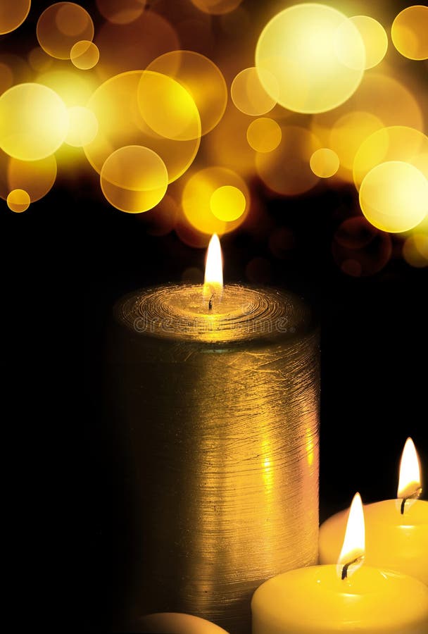 Golden Candles stock image. Image of fire, lights, setting - 57423119