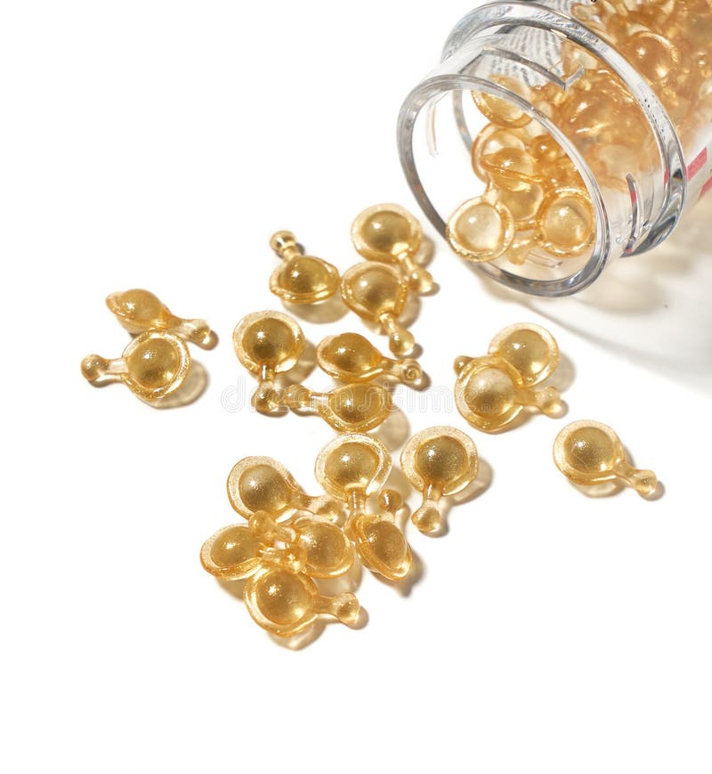 Golden Capsule in the Bottle-cap Stock Image - Image of gold, white ...