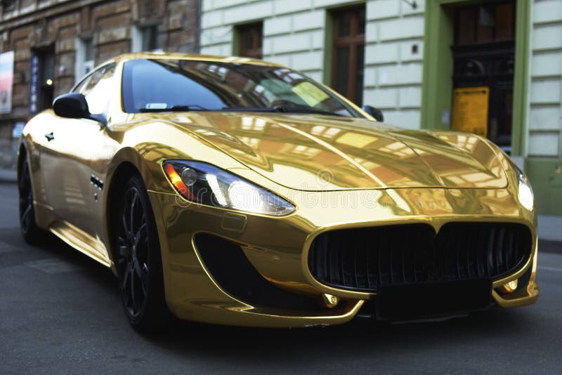 A Golden Car, a Golden Car on the Street, a Luxury Car Stock Image ...