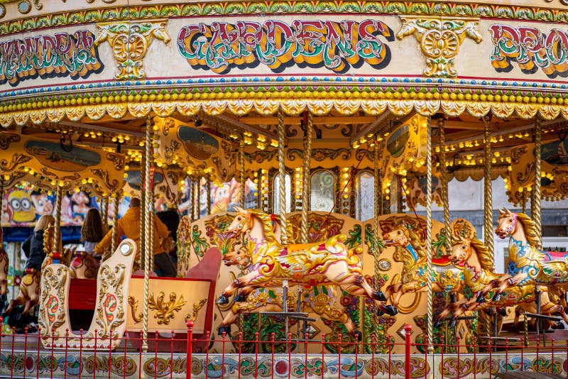 Golden Carousel in the Amusement Park Editorial Photography - Image of ...