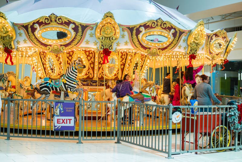 Golden carousel ride editorial stock photo. Image of decoration - 81956993