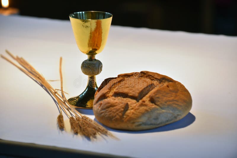 Golden chalice, bread. stock photo. Image of book, supper - 77681928