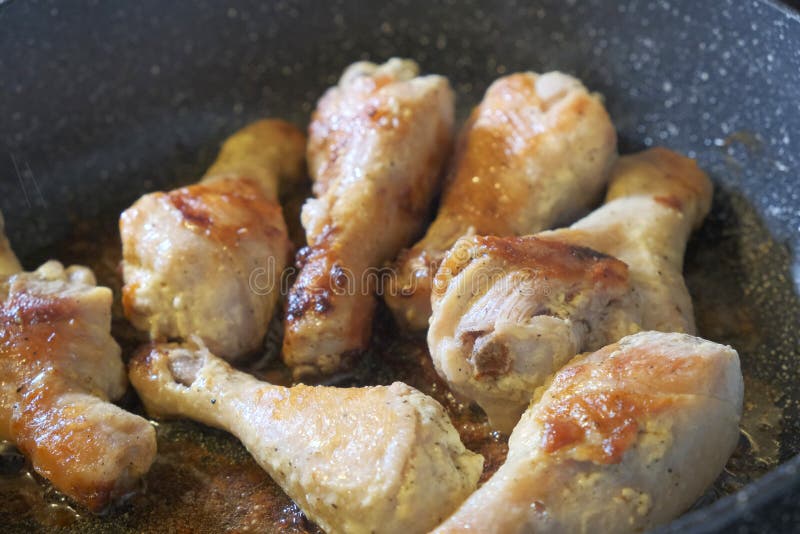 Golden Chicken Legs in Batter Fried in a Pan Stock Photo - Image of ...