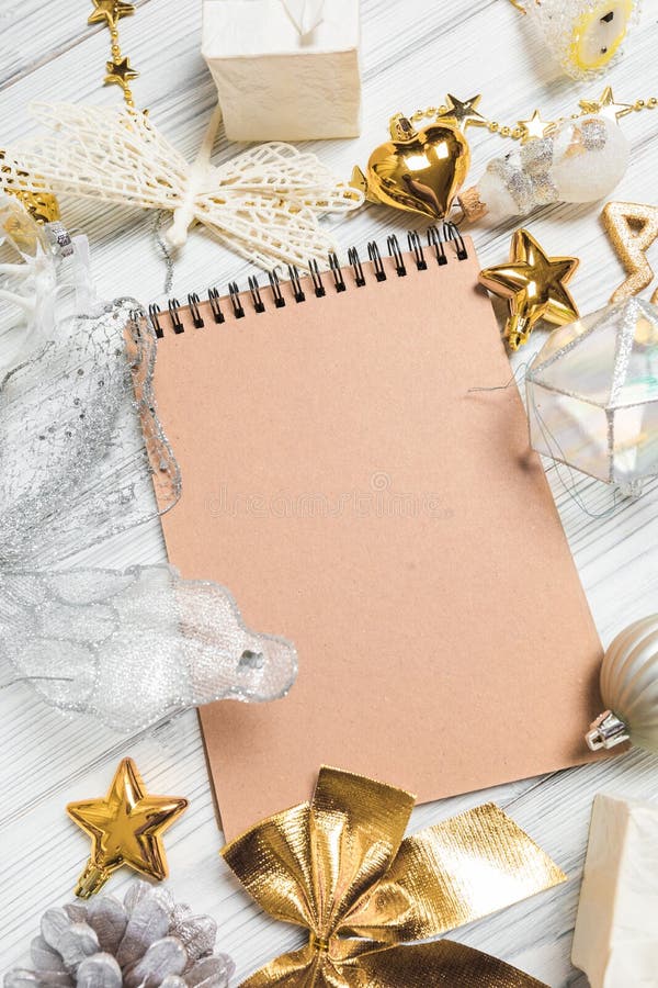 Golden Christmas Decorations and Notebook on White Background. Flat Lay ...