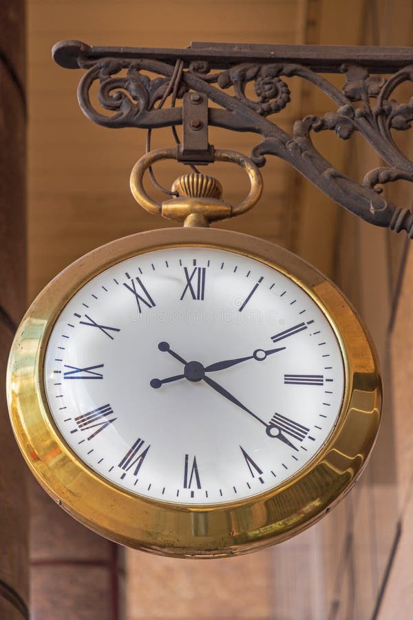 Golden Clock stock image. Image of illuminated, needles - 211485863