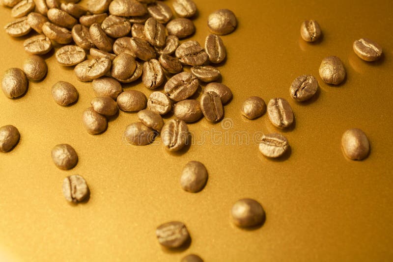 Golden coffee beans stock image. Image of background - 39775259