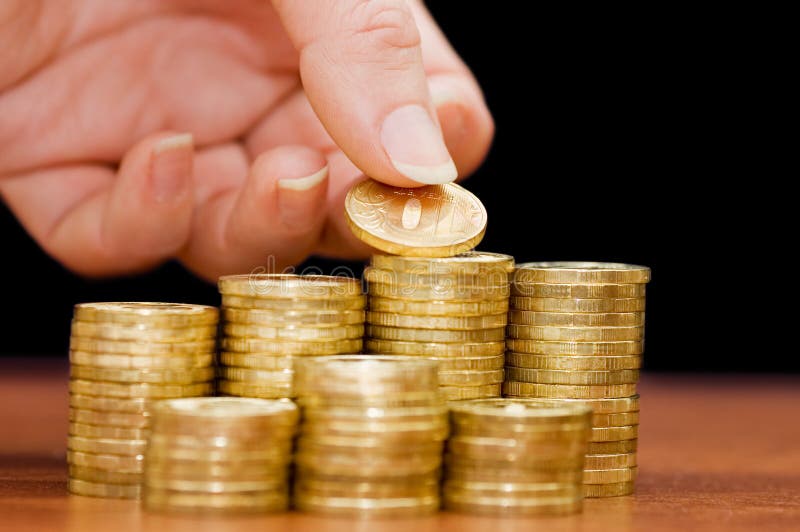 Golden Coins on a Wooden Table Stock Image - Image of coins, cash: 17408519