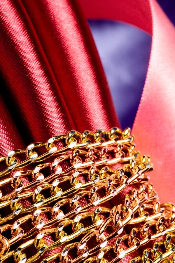 Golden Color Chain Over Red Silk Stock Image - Image of pattern, luxury ...