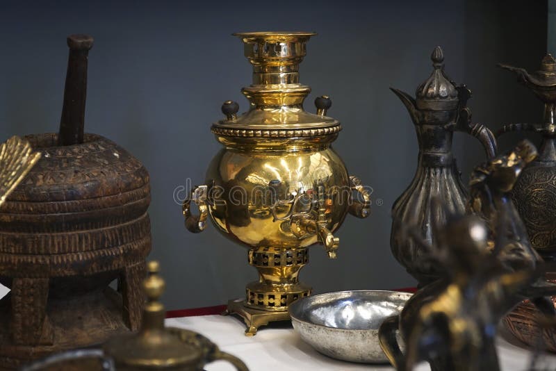 Golden Colored Samovar stock image. Image of store, cultures - 141911493