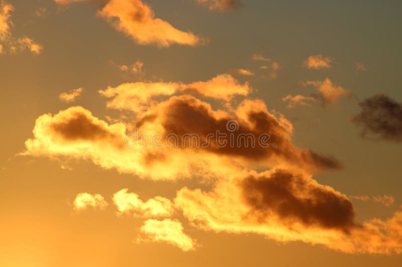 Golden Colors on Clouds in Sky at Sunset Stock Photo - Image of ...