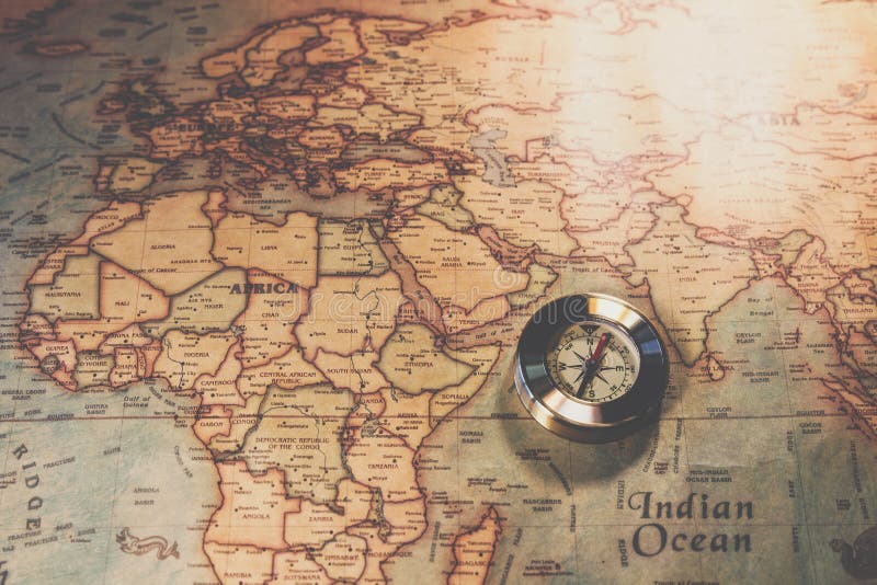 Golden Compass and the Map. Travel and Navigation Theme. Map Use Stock ...