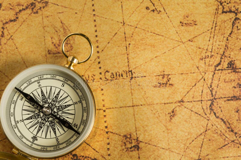 Golden Compass on an Old Map. Selective Focus Stock Image - Image of ...