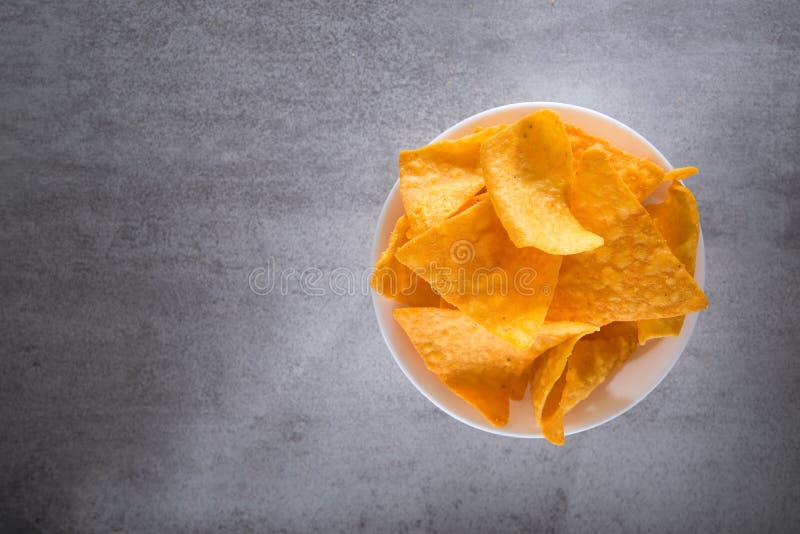Golden corn nachos chips stock photo. Image of cultural - 141862746