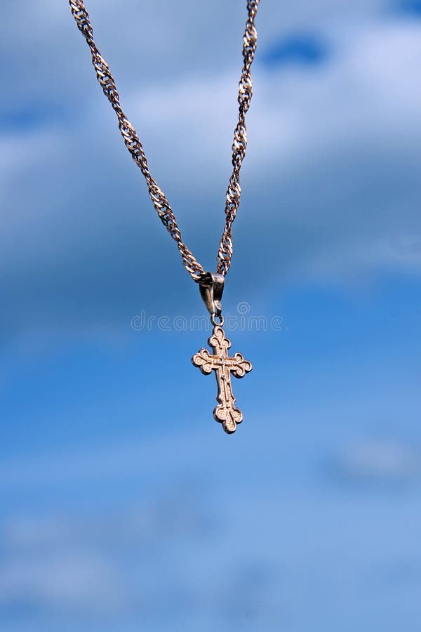Golden cross on chain stock photo. Image of believe, close - 17038004