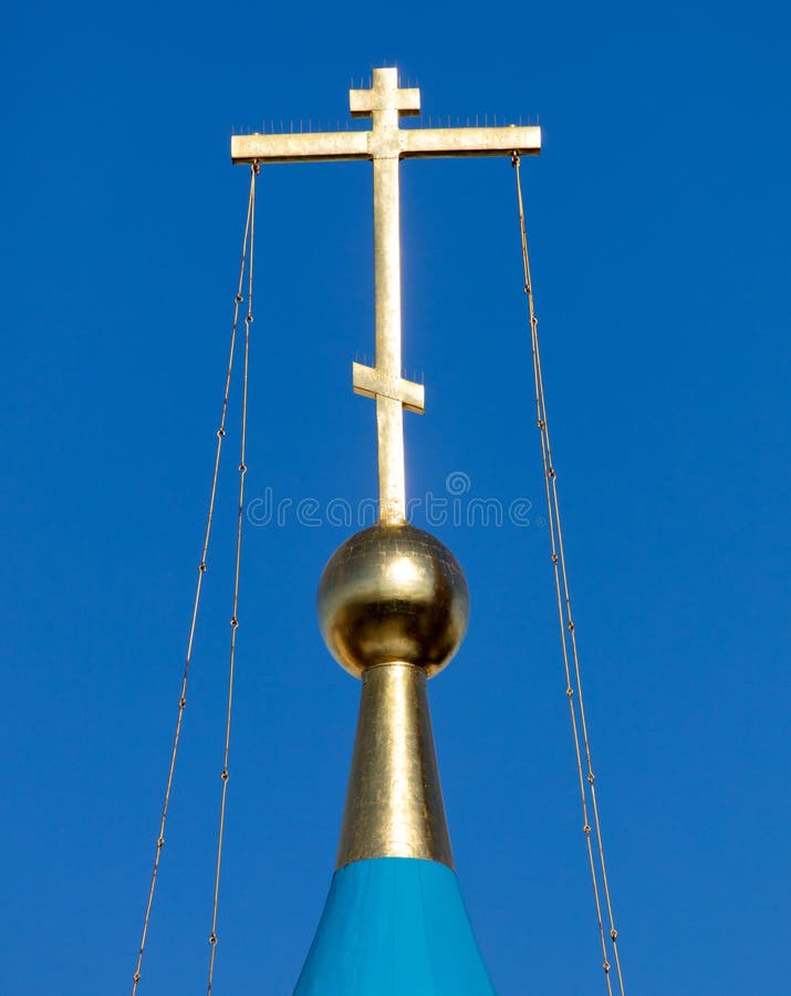 The Golden Cross on the Orthodox Temple Against the Blue Sky Stock ...