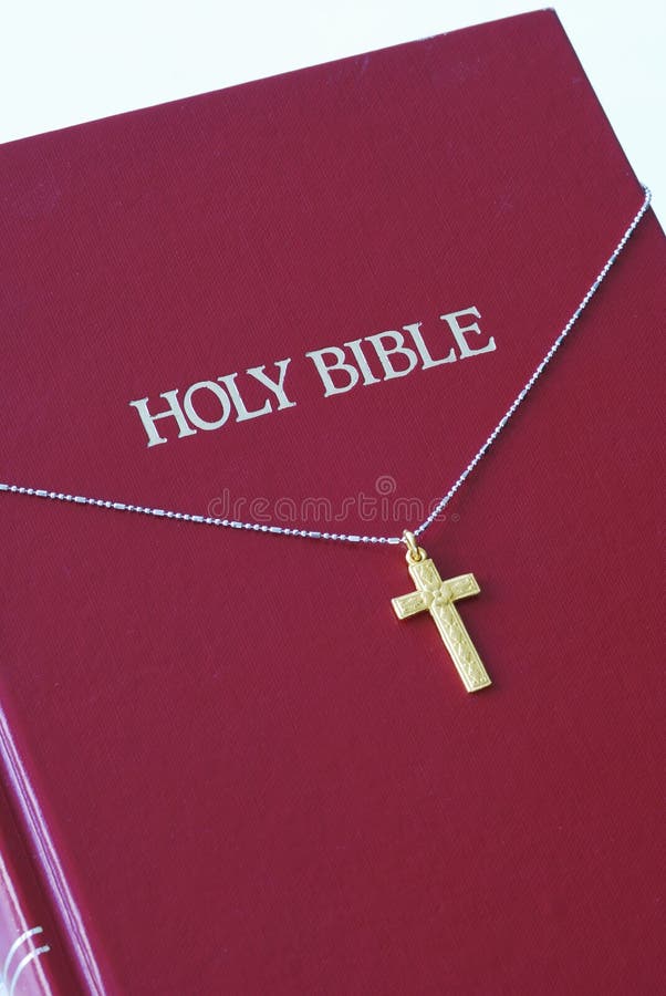 A Golden Cross on the Top of a Red Bible Stock Photo - Image of faith ...