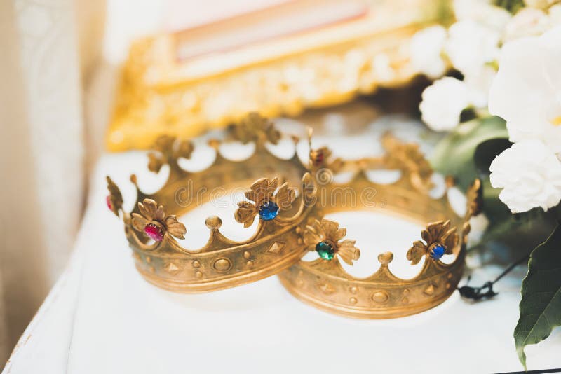 Golden Crowns Lying on the Table in Church Stock Image - Image of ...