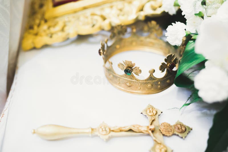 Golden Crowns Lying on the Table in Church Stock Photo - Image of light ...