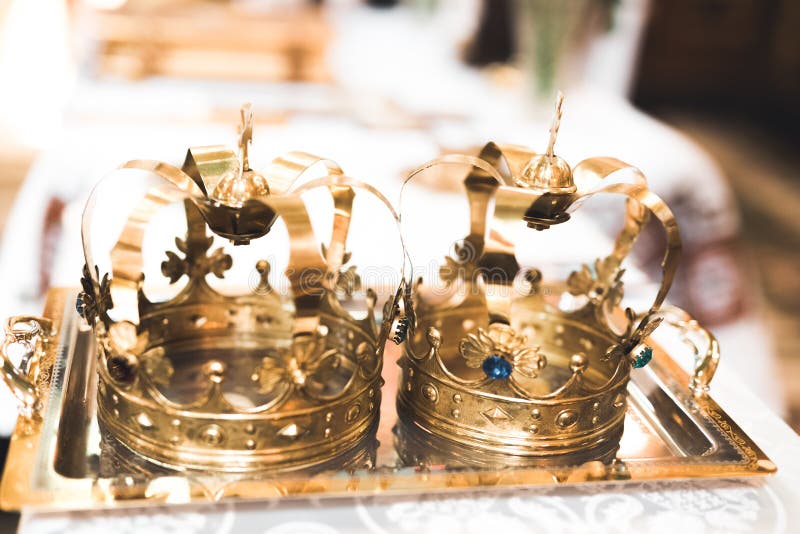 Golden Crowns Lying on the Table in Church Stock Image - Image of ...