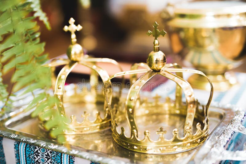 Golden Crowns Lying on the Table in Church Stock Image - Image of ...