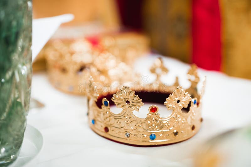 Golden Crowns Lying on the Table in Church Stock Photo - Image of ...