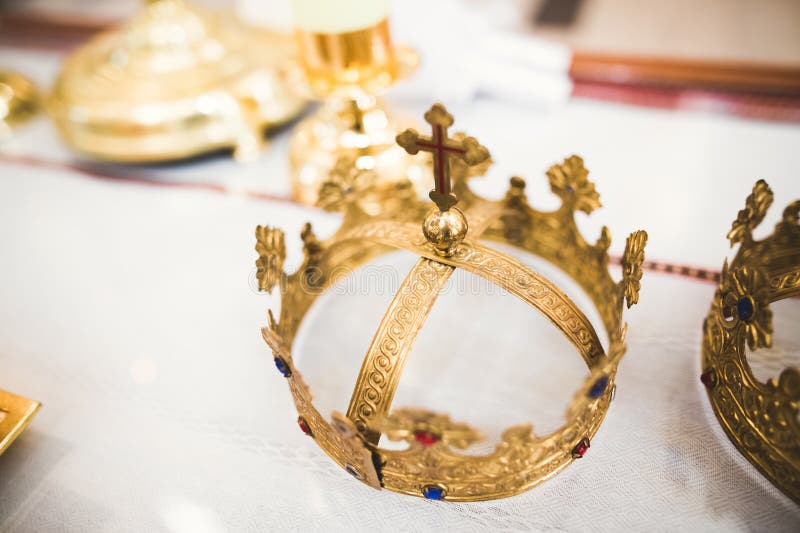 Golden Crowns Lying on the Table in Church Stock Photo - Image of bride ...